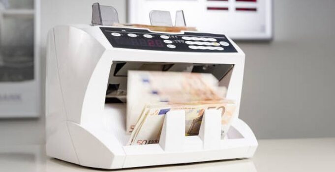 Benefits Of Using A Cash Counting Machine For Your Business - IQ Eye