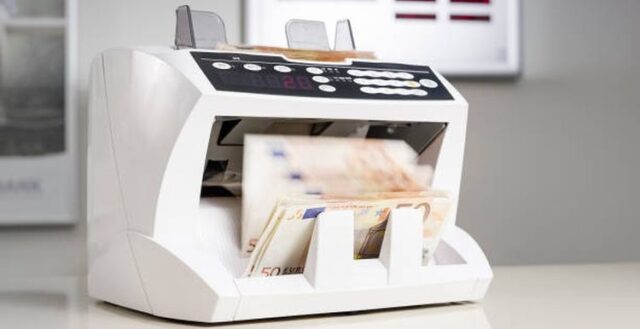 Benefits Of Using A Cash Counting Machine For Your Business - IQ Eye